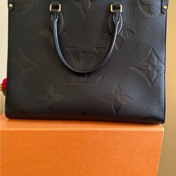Louis Vuitton | Bags | Louis Vuitton Black Monogram On The Go Bag ...